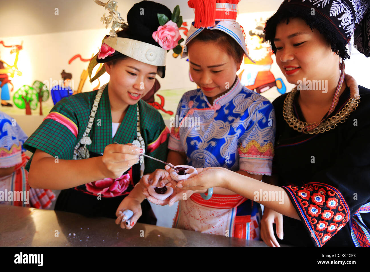 Qiandongnan, China's Guizhou Province. 3rd Oct, 2017. Li Liqin (L) of ...