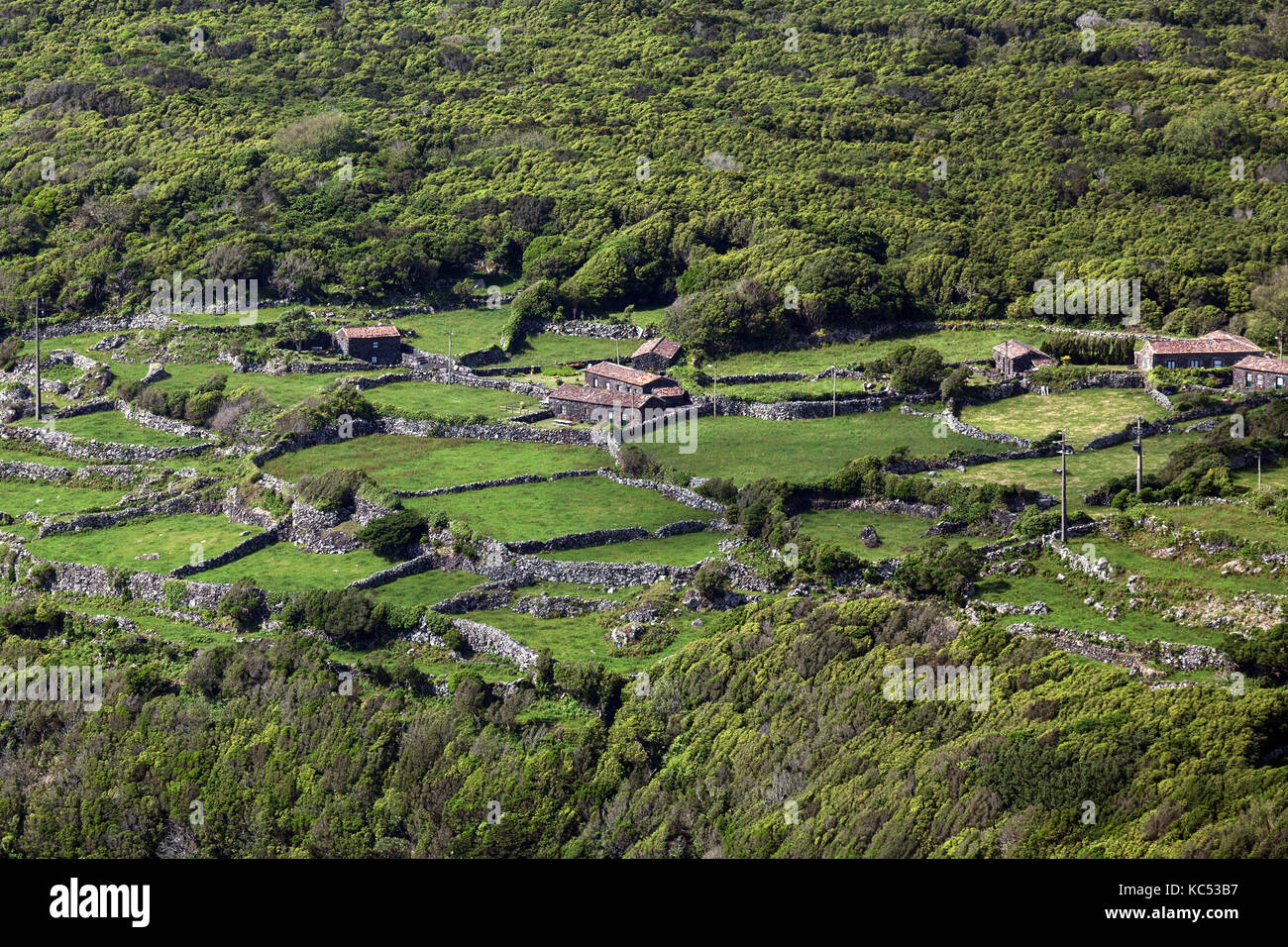Landscape with stone walls and meadows, typical stone houses, near ...