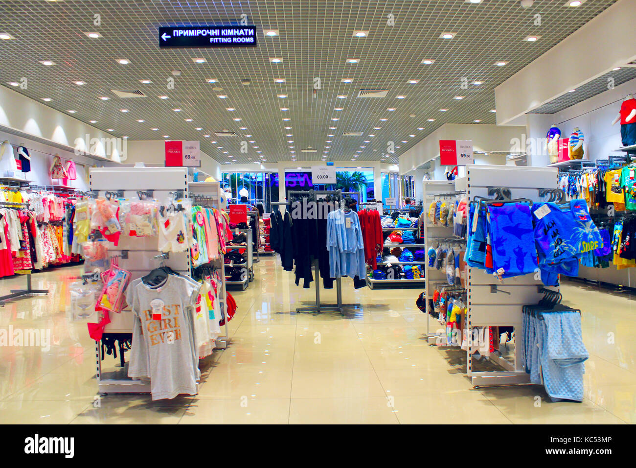great assortment of goods in shop of clothing Stock Photo - Alamy
