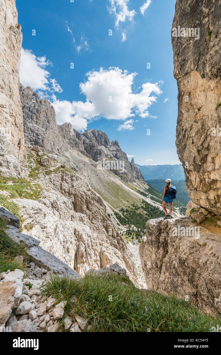 Hiker in the rosegarden group, Dolomites, South Tyrol, Trentino-Alto ...