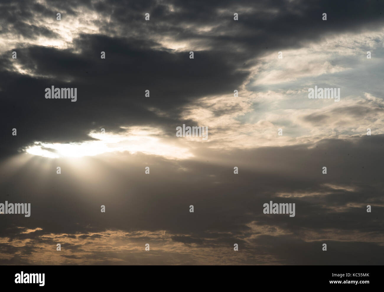 Sun rays coming out of the cloud hi-res stock photography and images ...