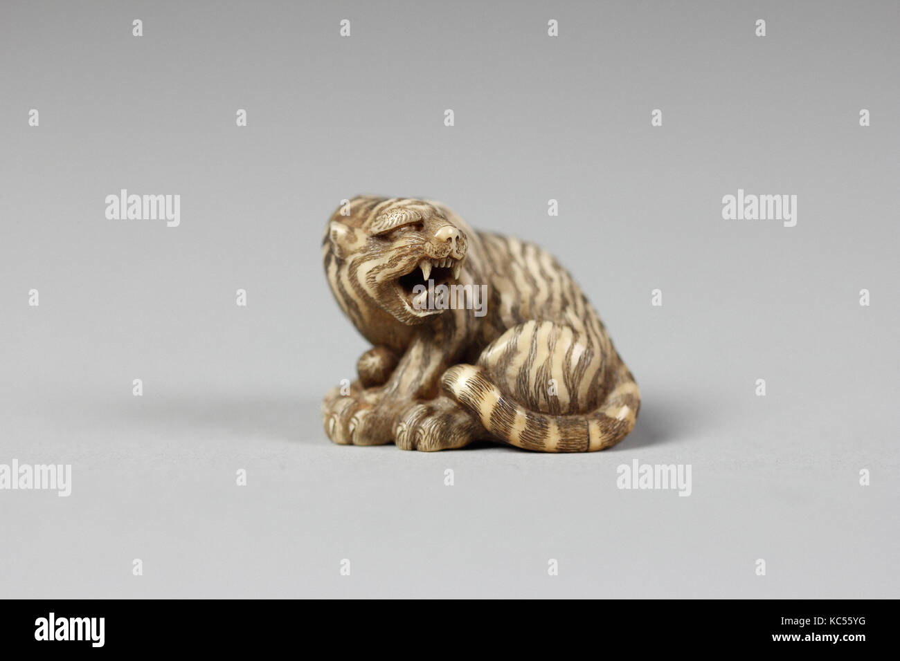 Netsuke of Tiger with Head Turned, 19th century, Japan, Ivory, H. 1 1/8 ...