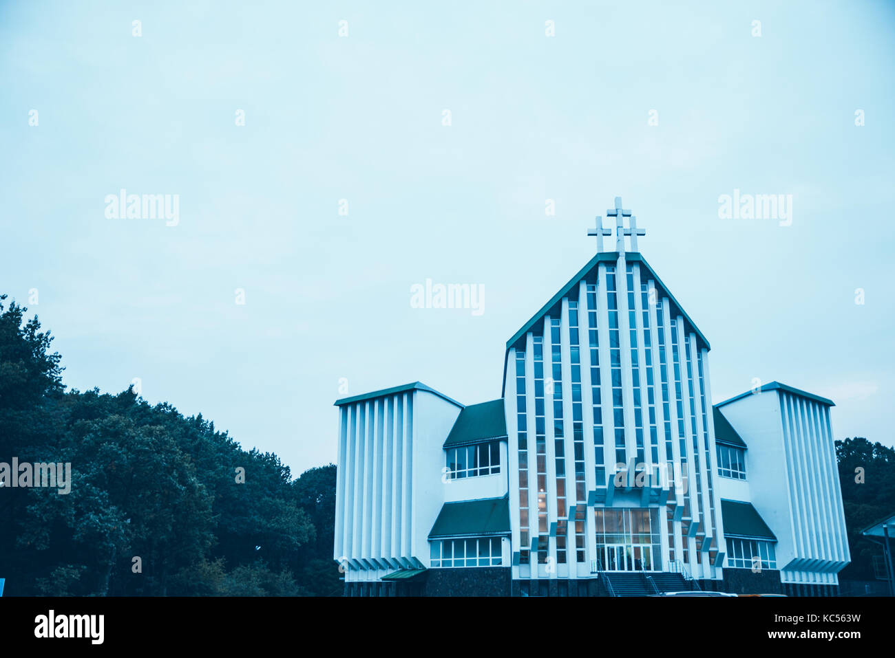 Architecture of a modern church with gray sky Stock Photo - Alamy