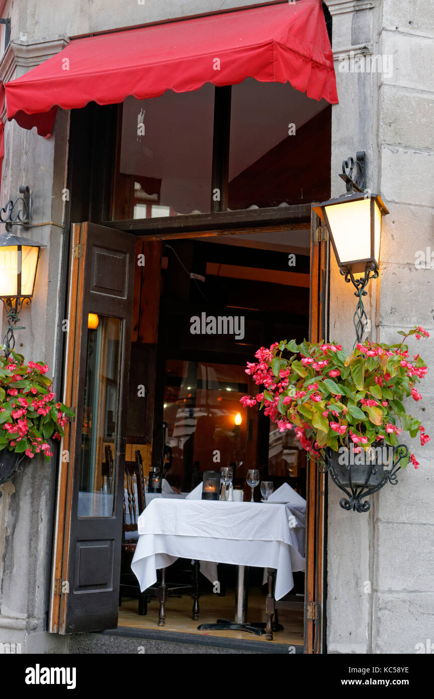 Romantic table set for two in the open window of a restaurant in Old ...
