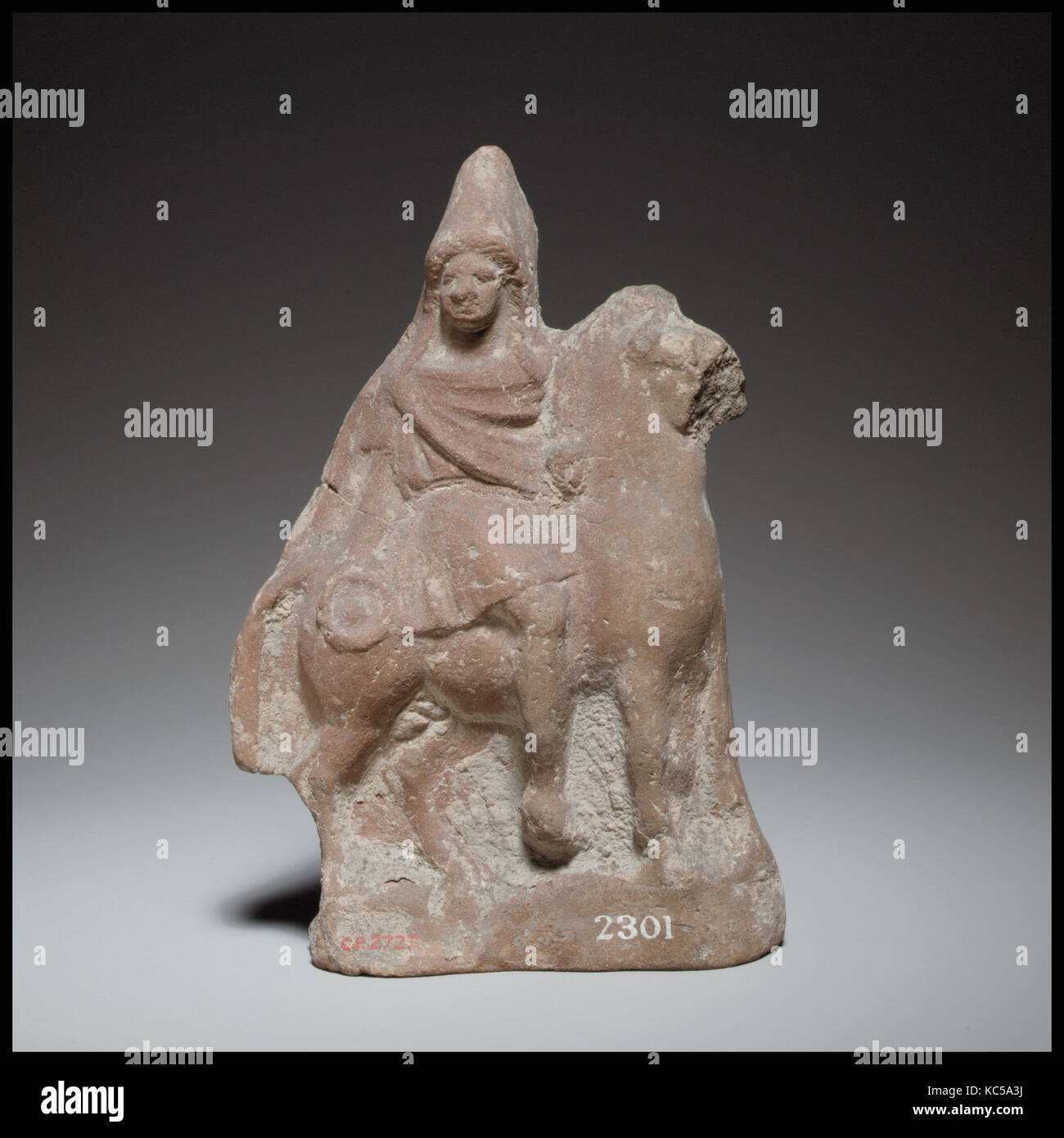 Terracotta statuette of a horse and rider, 3rd century B.C Stock Photo ...