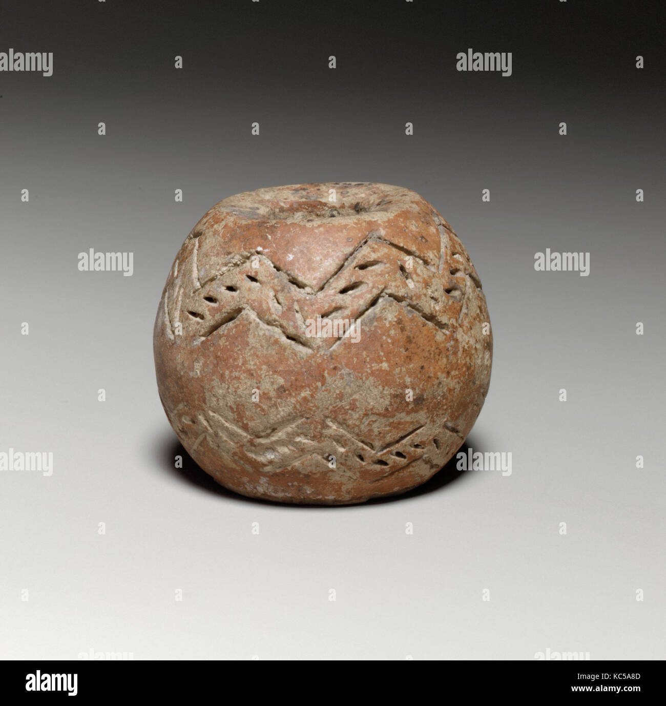 Spherical spindle-whorl with broad flat top and base, ca. 2000–1725 B.C ...