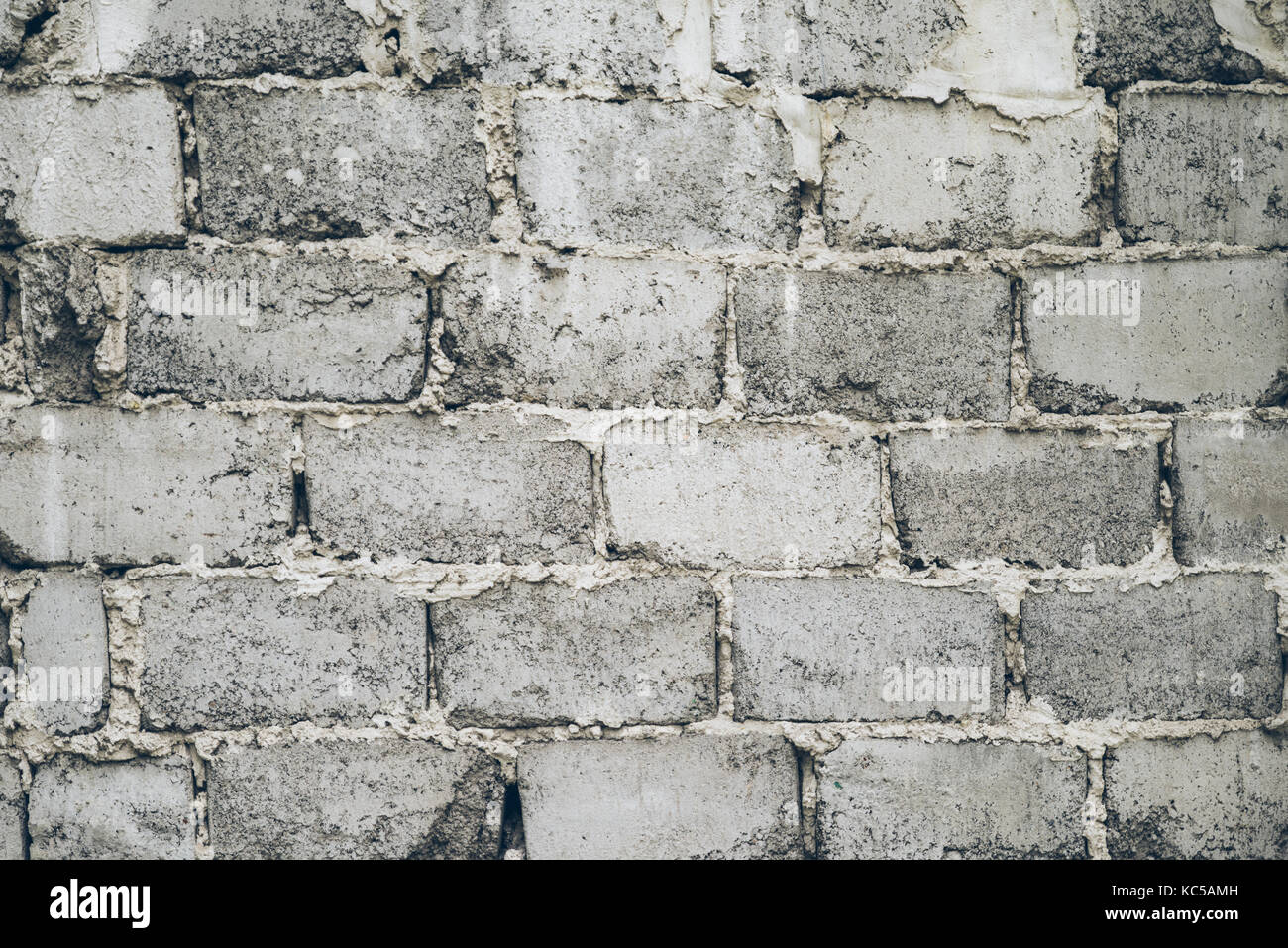 wall of gray cement bricks design concept Stock Photo - Alamy