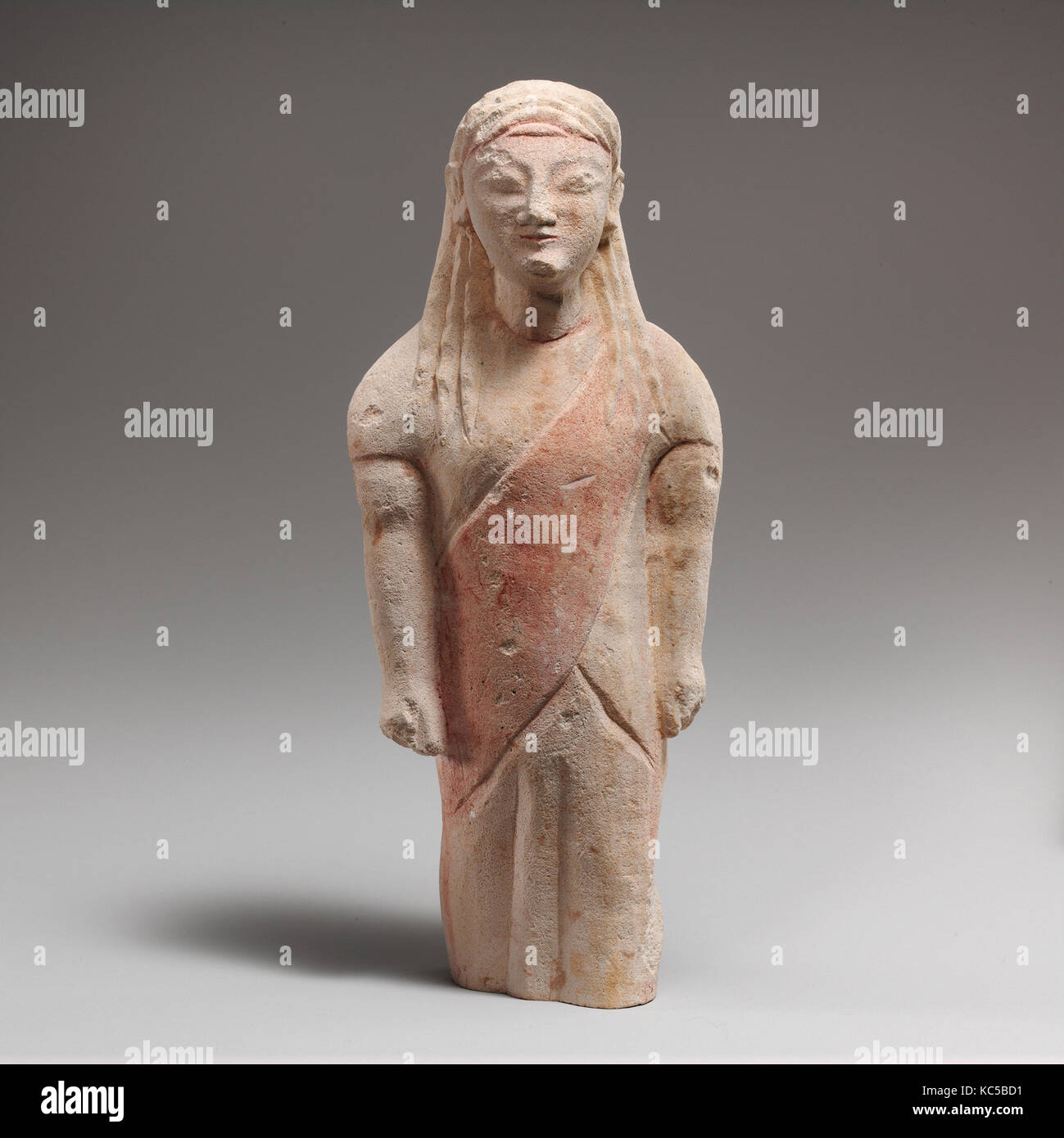 Limestone statuette of beardless male votary in Greek dress, mid-6th ...