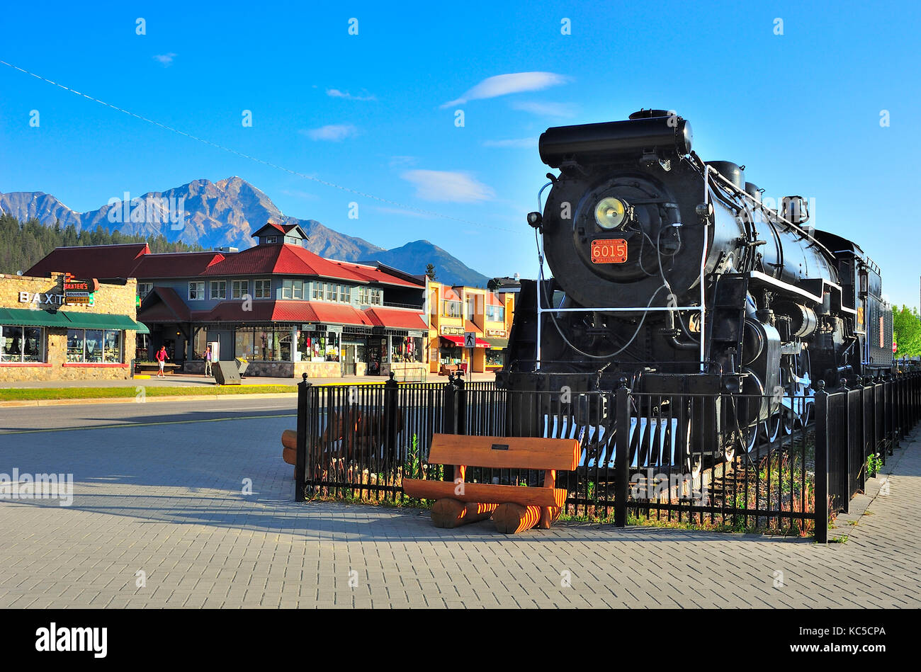 An antique locomotive steam engine used as a tourist attraction in the ...