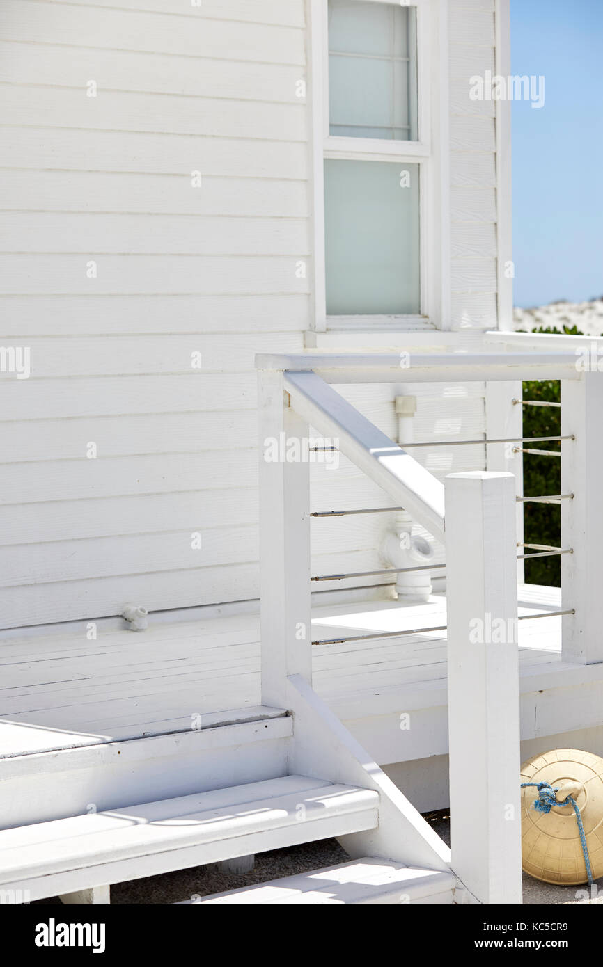 White slatted wooden beach house Stock Photo - Alamy