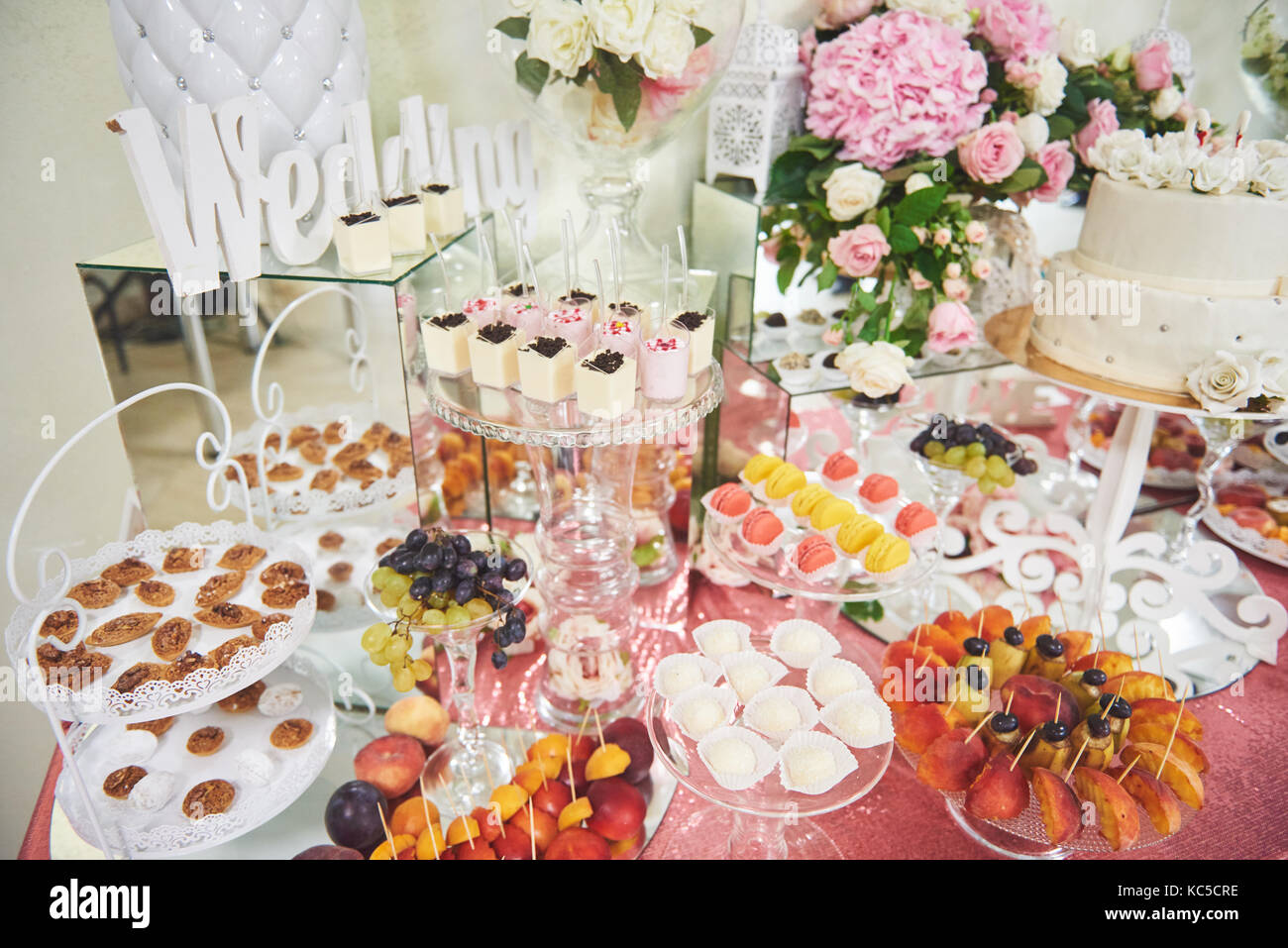 Delicious sweets on candy buffet Stock Photo - Alamy