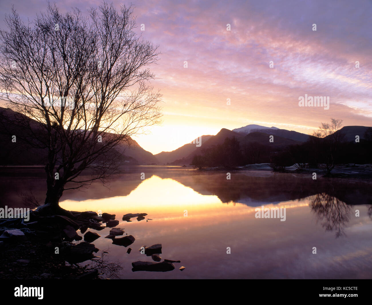 Looking east over Llyn Padarn lake towards LLanberis pass and Snowdon ...