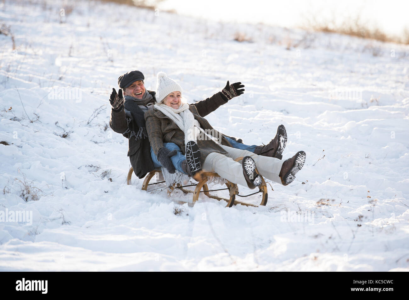 Winter sleigh elderly couple hi-res stock photography and images - Alamy