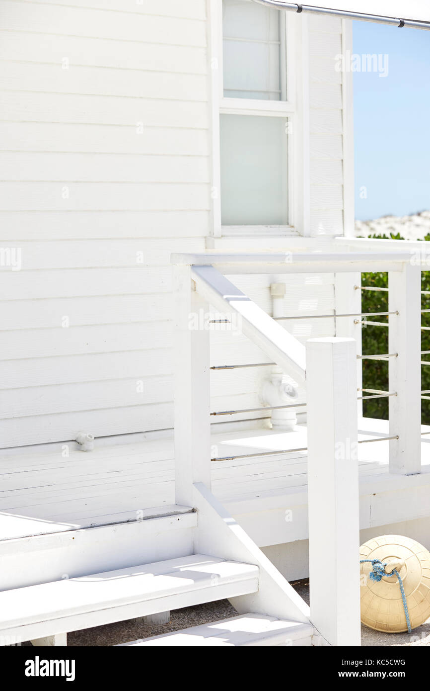 White slatted wooden beach house Stock Photo - Alamy
