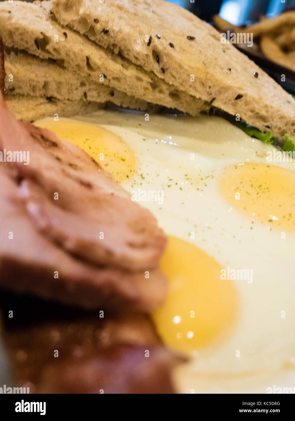 Ham, egg, bacon, German sausage and toast brunch Stock Photo - Alamy