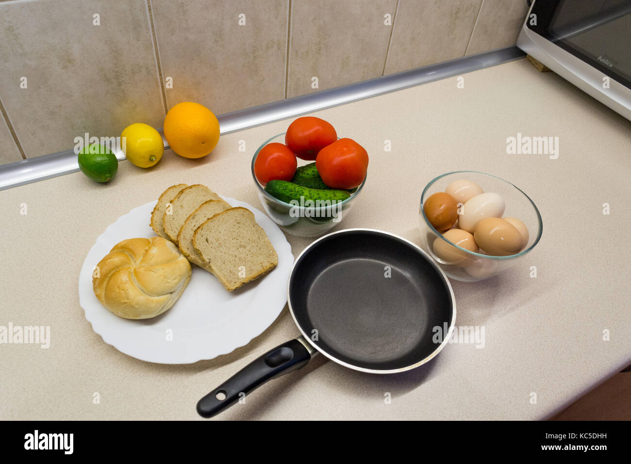 Breakfast - scrambled eggs with toppings Stock Photo - Alamy