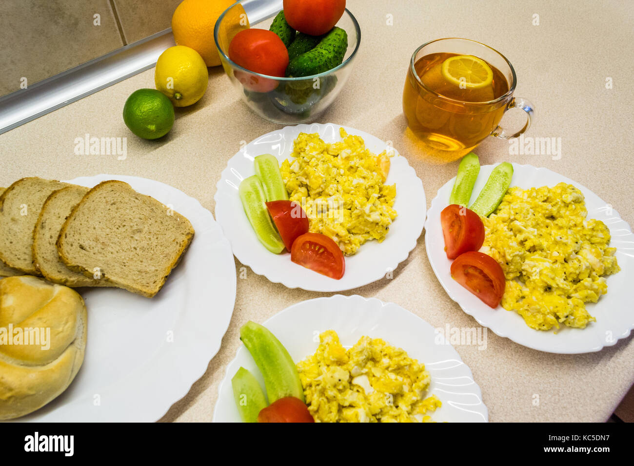 Breakfast - scrambled eggs with toppings Stock Photo - Alamy