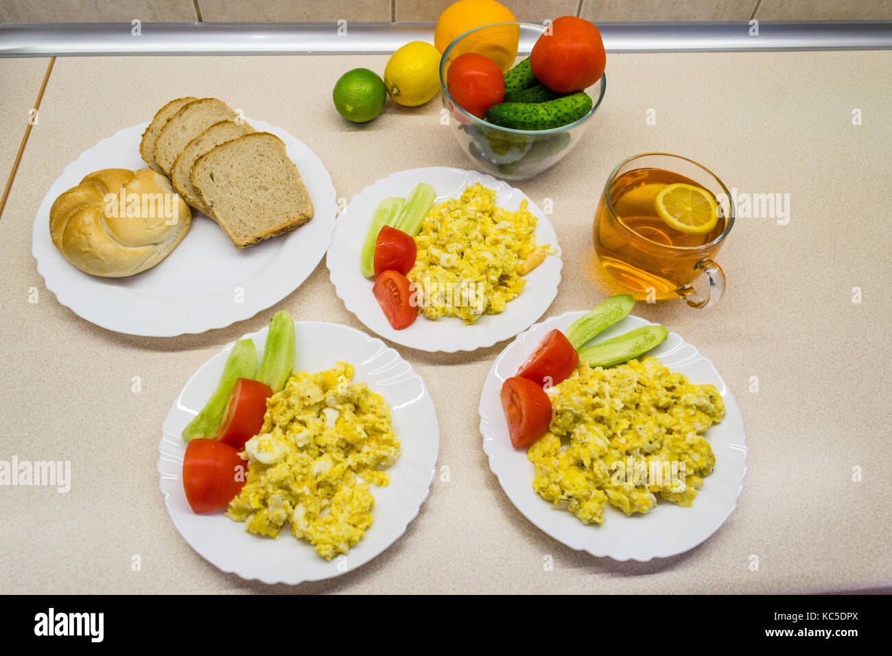Breakfast - scrambled eggs with toppings Stock Photo - Alamy
