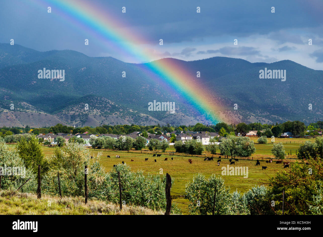 Rainbow over the small mountain town of Salida, Colorado, USA Stock ...