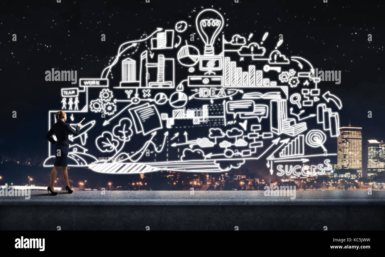 Woman throwing light on her ideas Stock Photo - Alamy