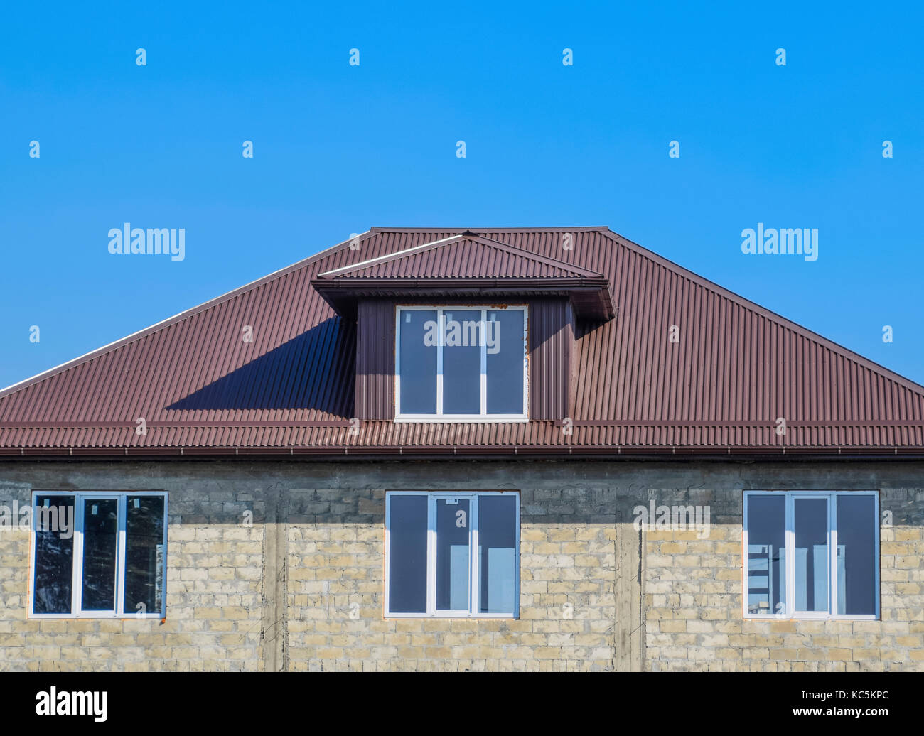 House of cinder block. The house with plastic windows and a roof of ...