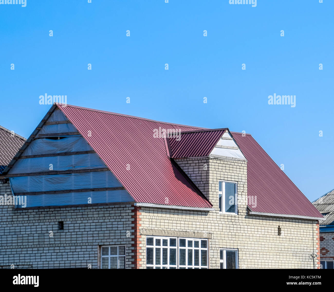 House of cinder block. The house with plastic windows and a roof of ...