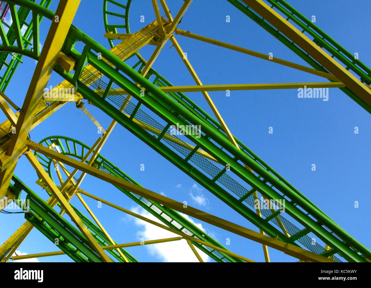 Close up of a roller coaster in a fairground Stock Photo - Alamy