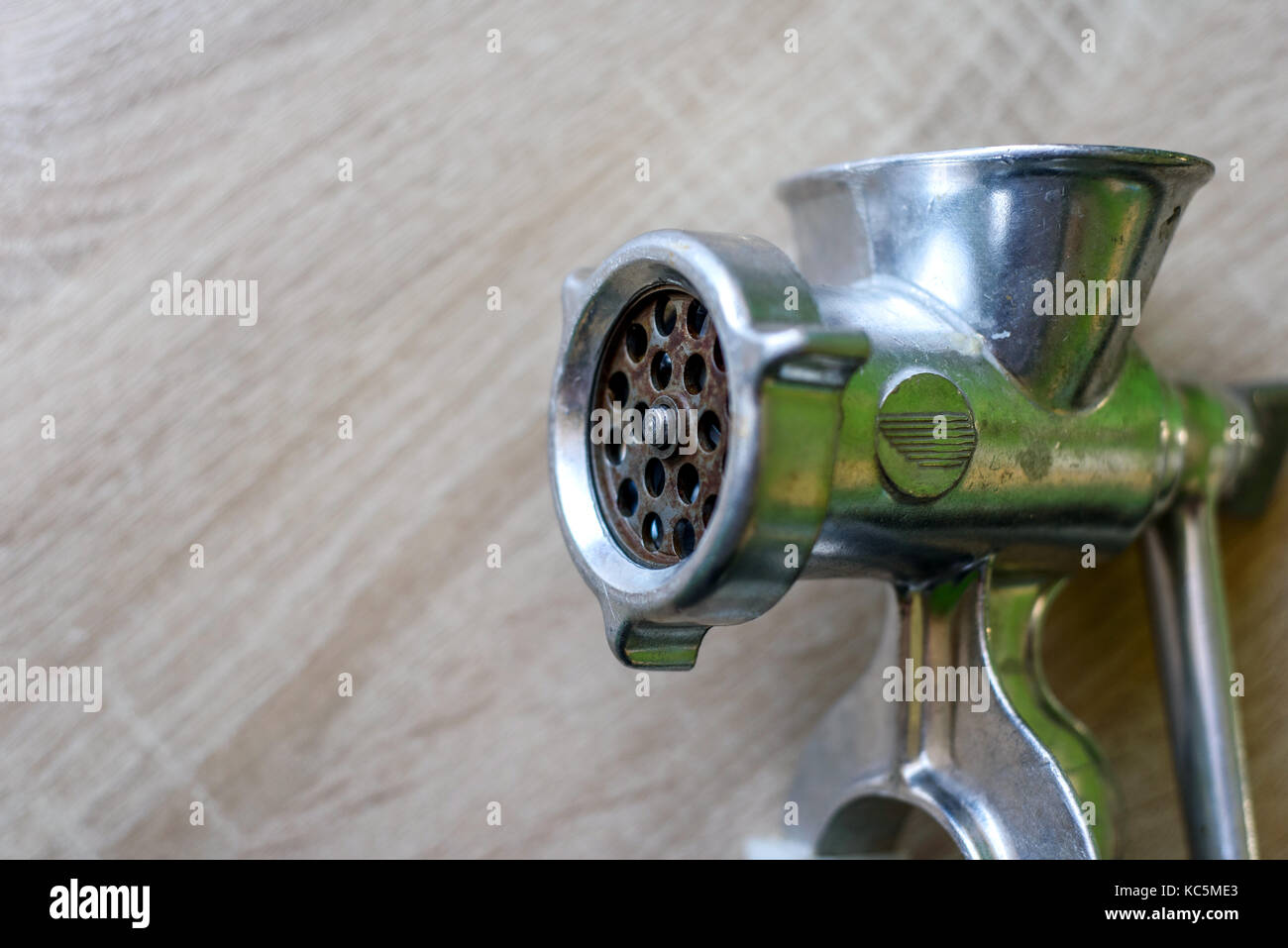 Closeup of a hand operated manual mincemeat making machine showing the ...