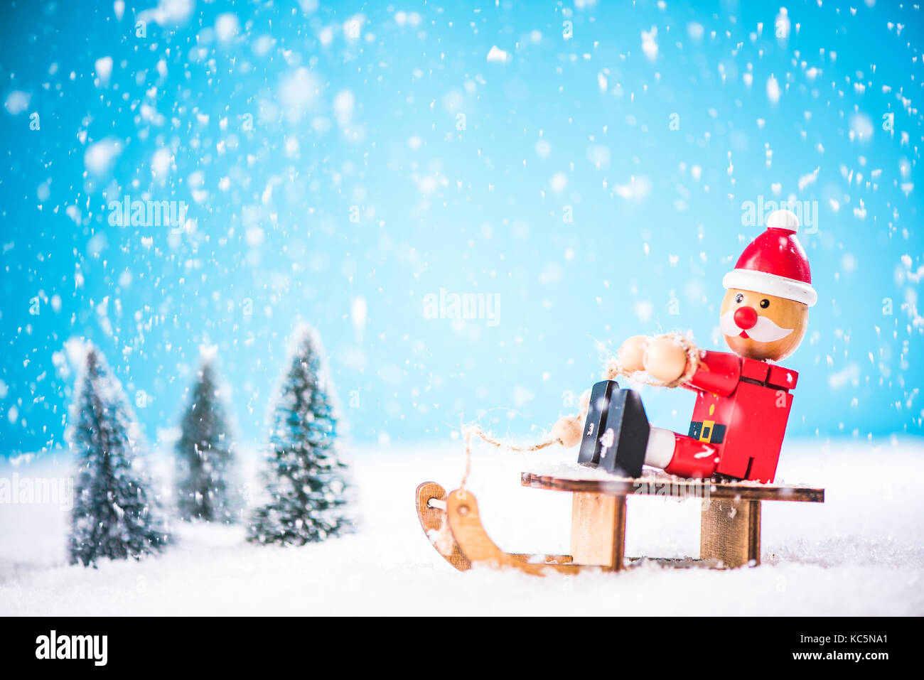 Santa have fun on snow sledge, winter and Christmas time Stock Photo ...