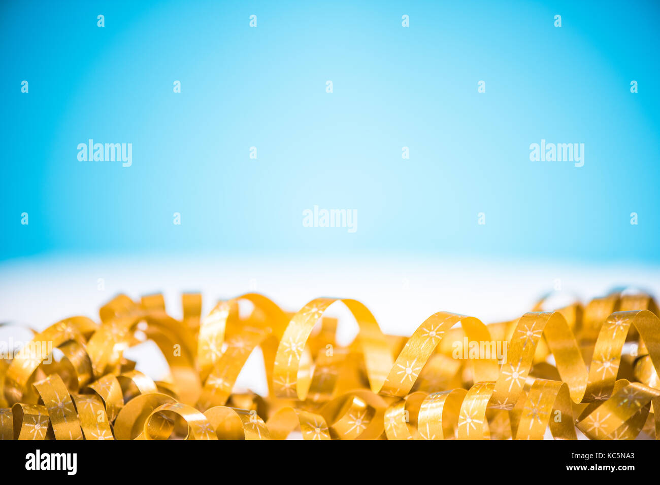 Golden Christmas ribbon Stock Photo - Alamy