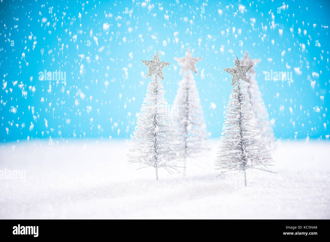 Christmas golden trees in snow Stock Photo - Alamy