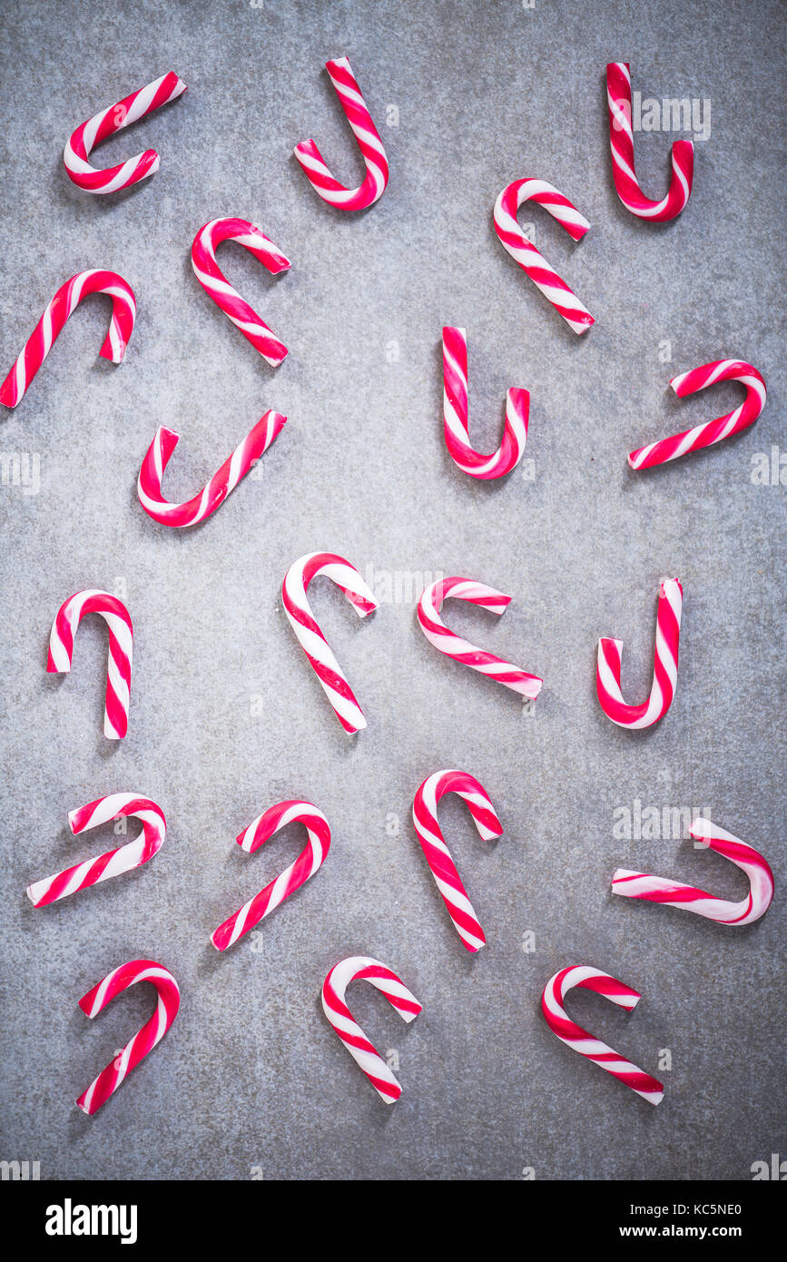 Christmas sugar canes on stone slate Stock Photo - Alamy