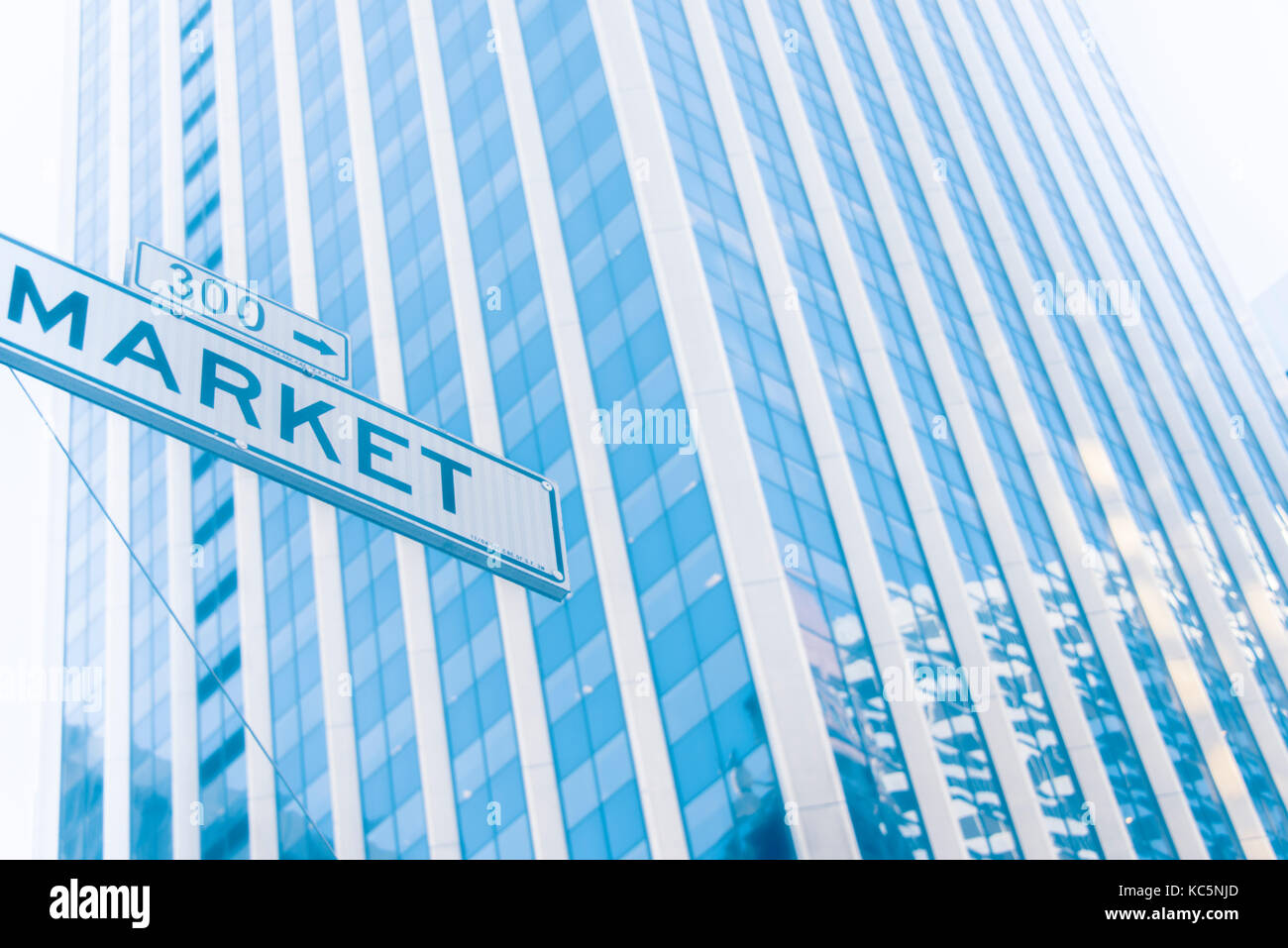Market street sign, San Francisco, California. Light-colored business ...