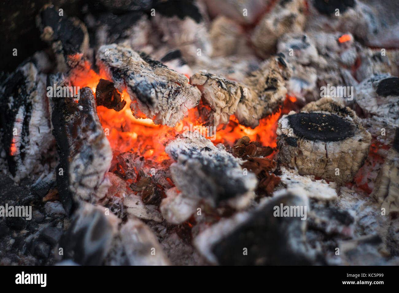 Burning charcoal with fire in a grill place Stock Photo - Alamy