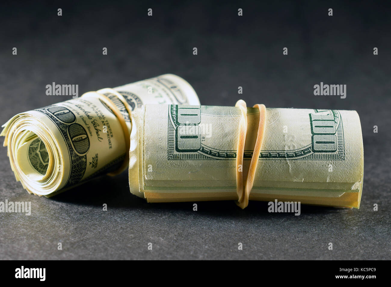 Money rolls hi-res stock photography and images - Alamy