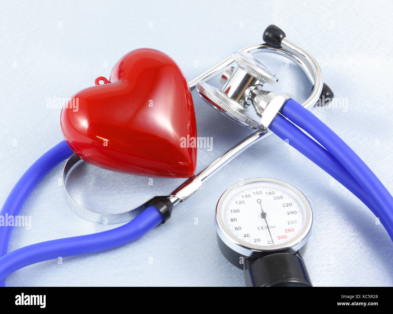 Medical instruments, stethoscope and red heart closeup shot Stock Photo ...