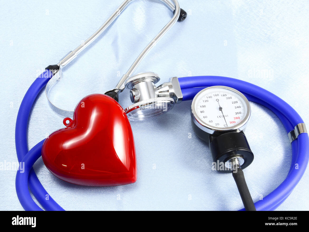 Medical instruments, stethoscope and red heart closeup shot Stock Photo ...