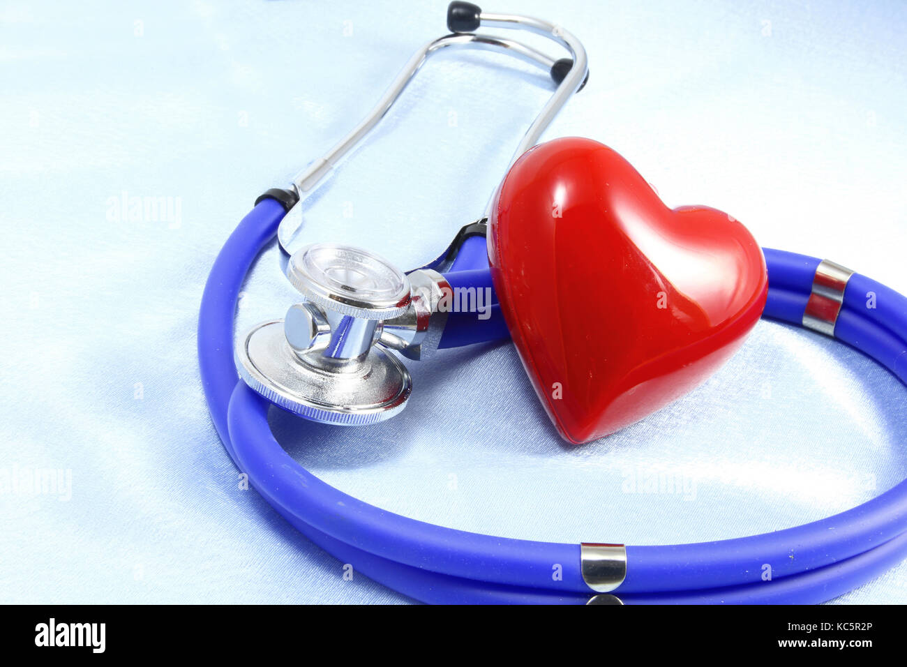 Medical instruments, stethoscope and red heart closeup shot Stock Photo ...