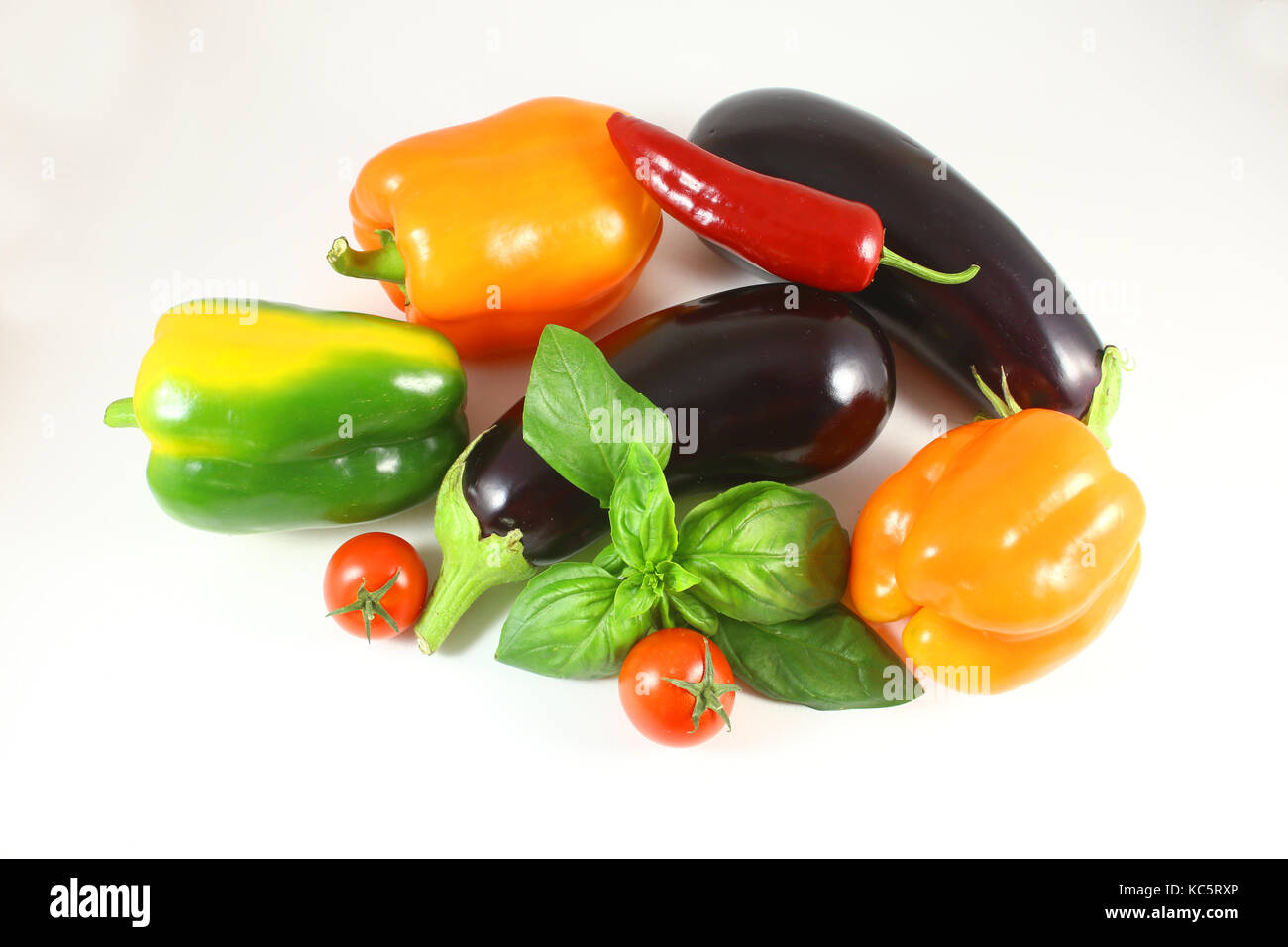 Fresh healthy eggplants chili bell pepper on white background Stock ...