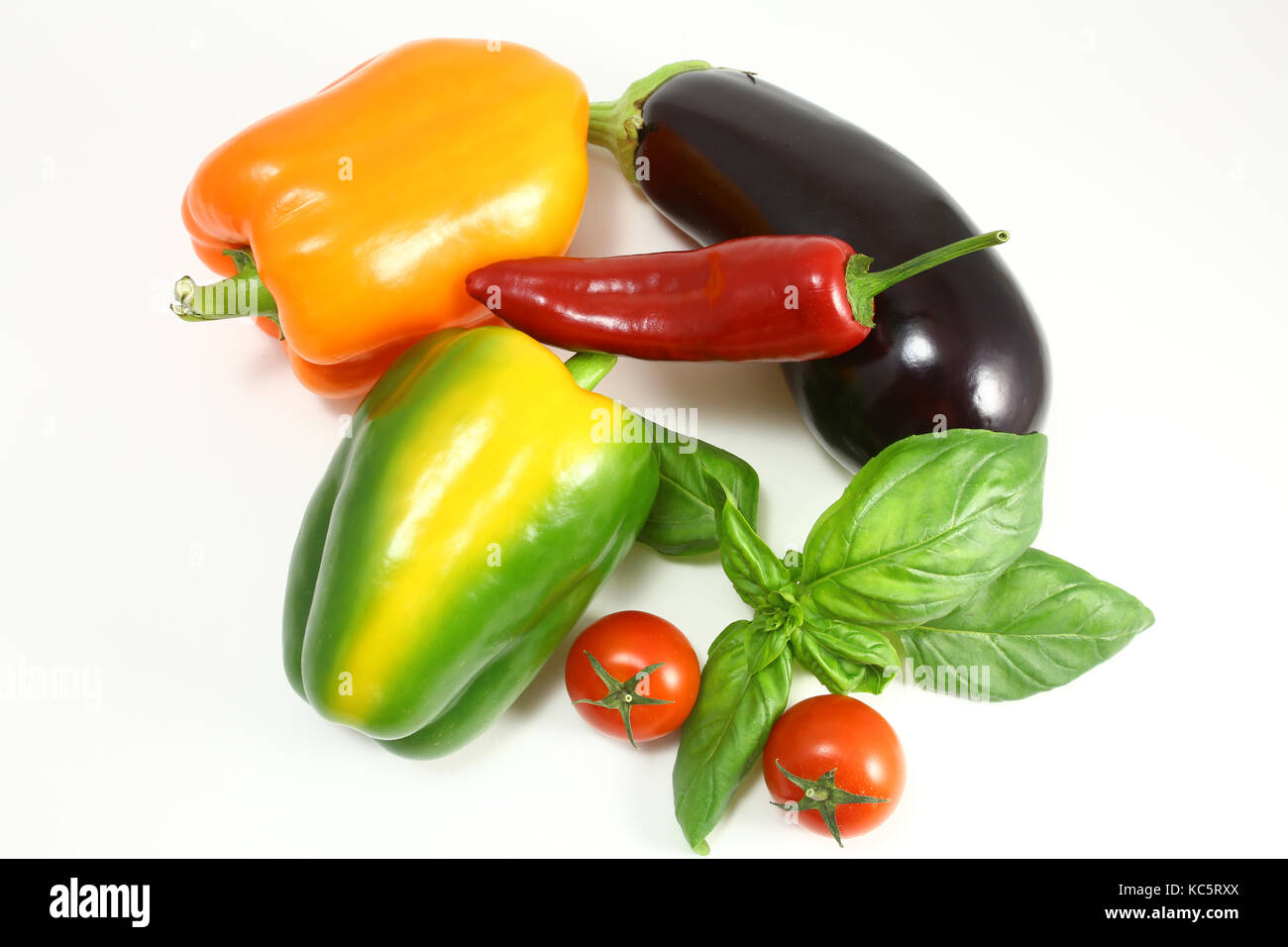 Fresh healthy eggplants chili bell pepper on white background Stock ...