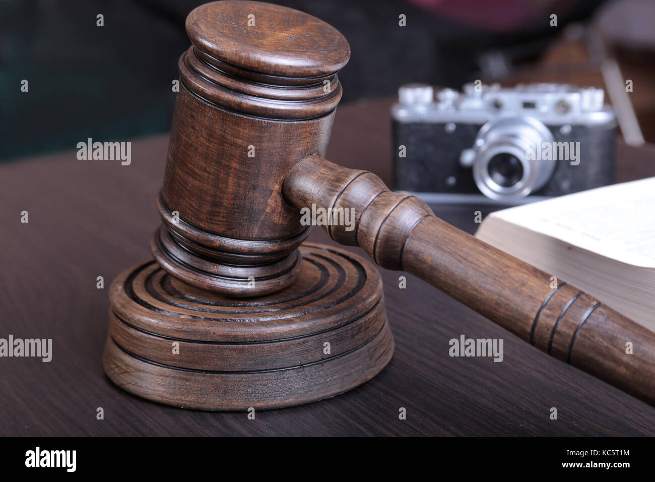 auction hammer , symbol of authority and vintage camera Stock Photo - Alamy