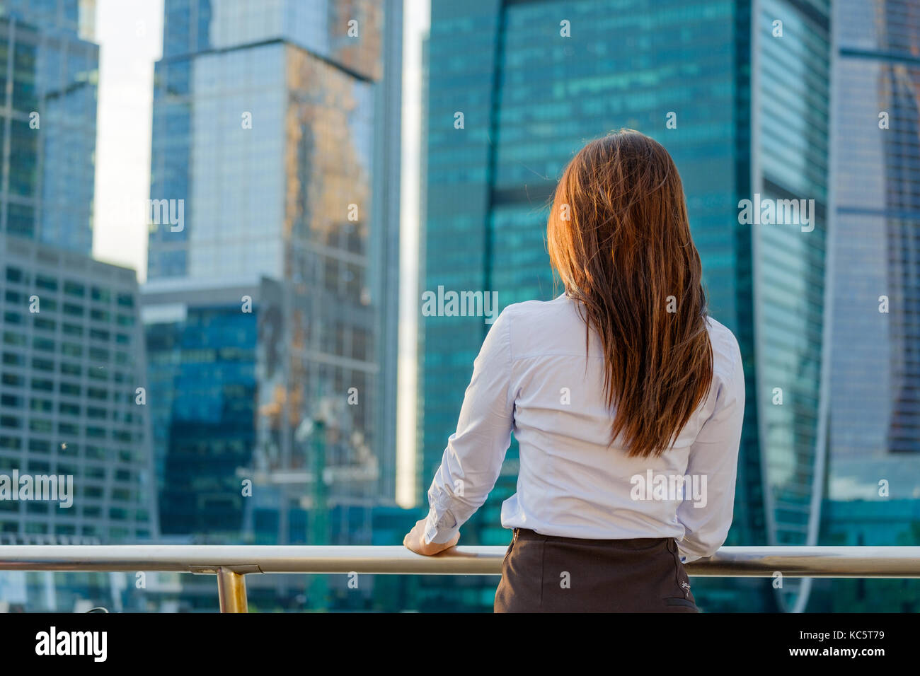 Young business woman back view Stock Photo - Alamy