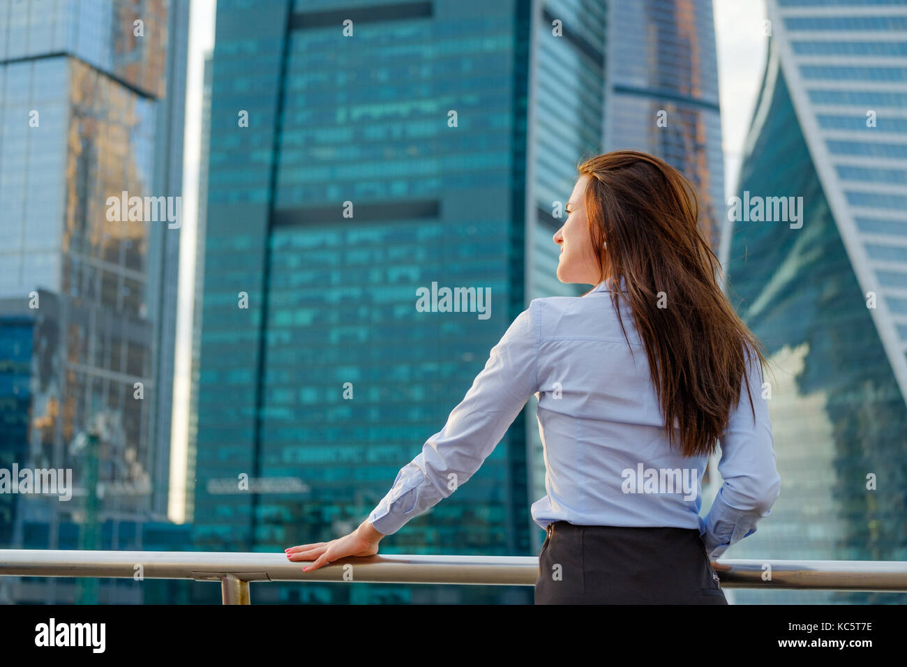 Young business woman back view Stock Photo - Alamy