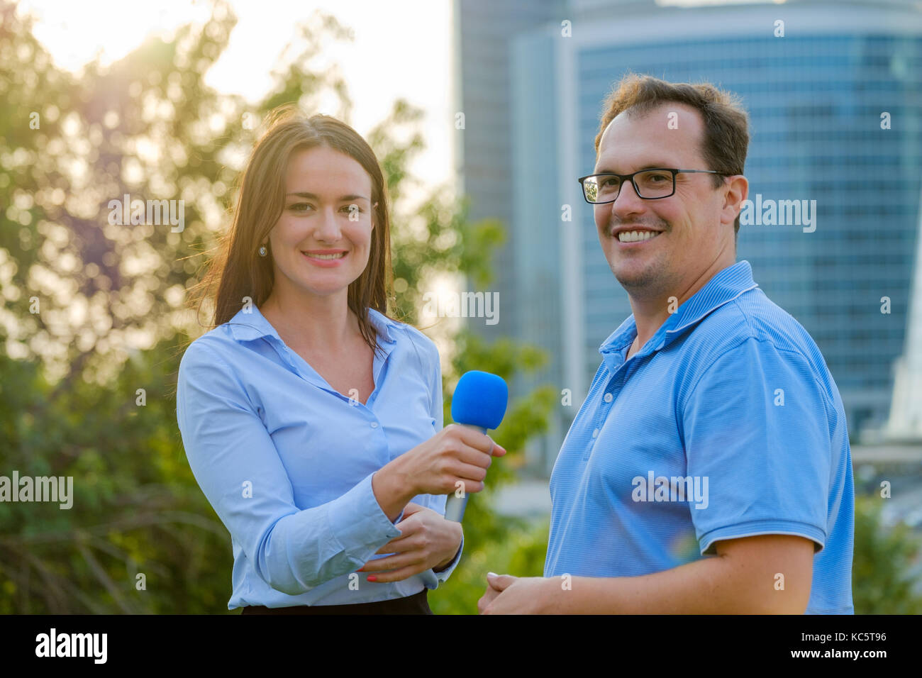 Young girl TV reporter is broadcasting Stock Photo - Alamy