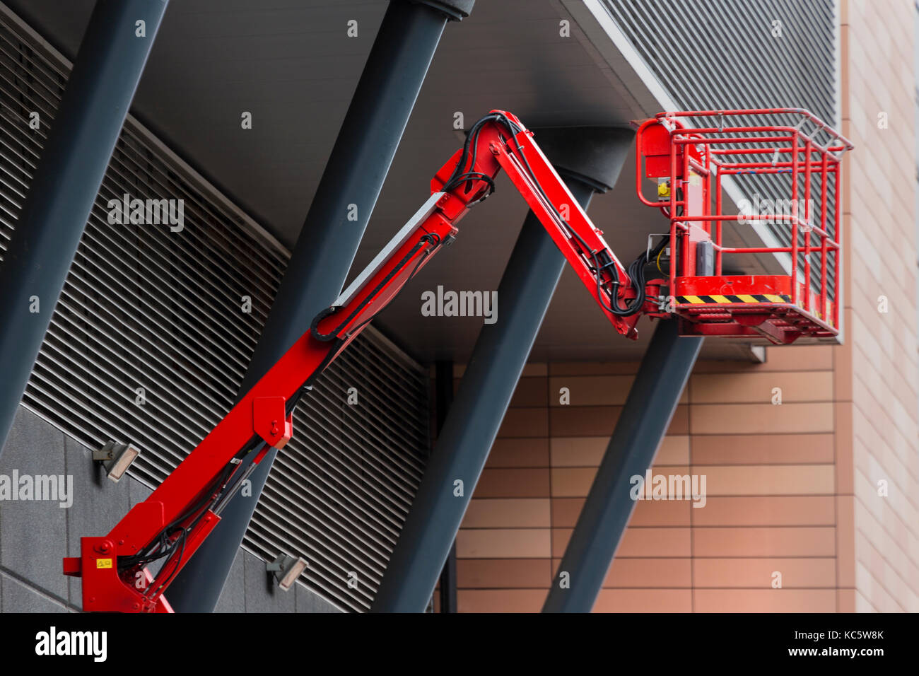 Red cherry picker hi-res stock photography and images - Alamy