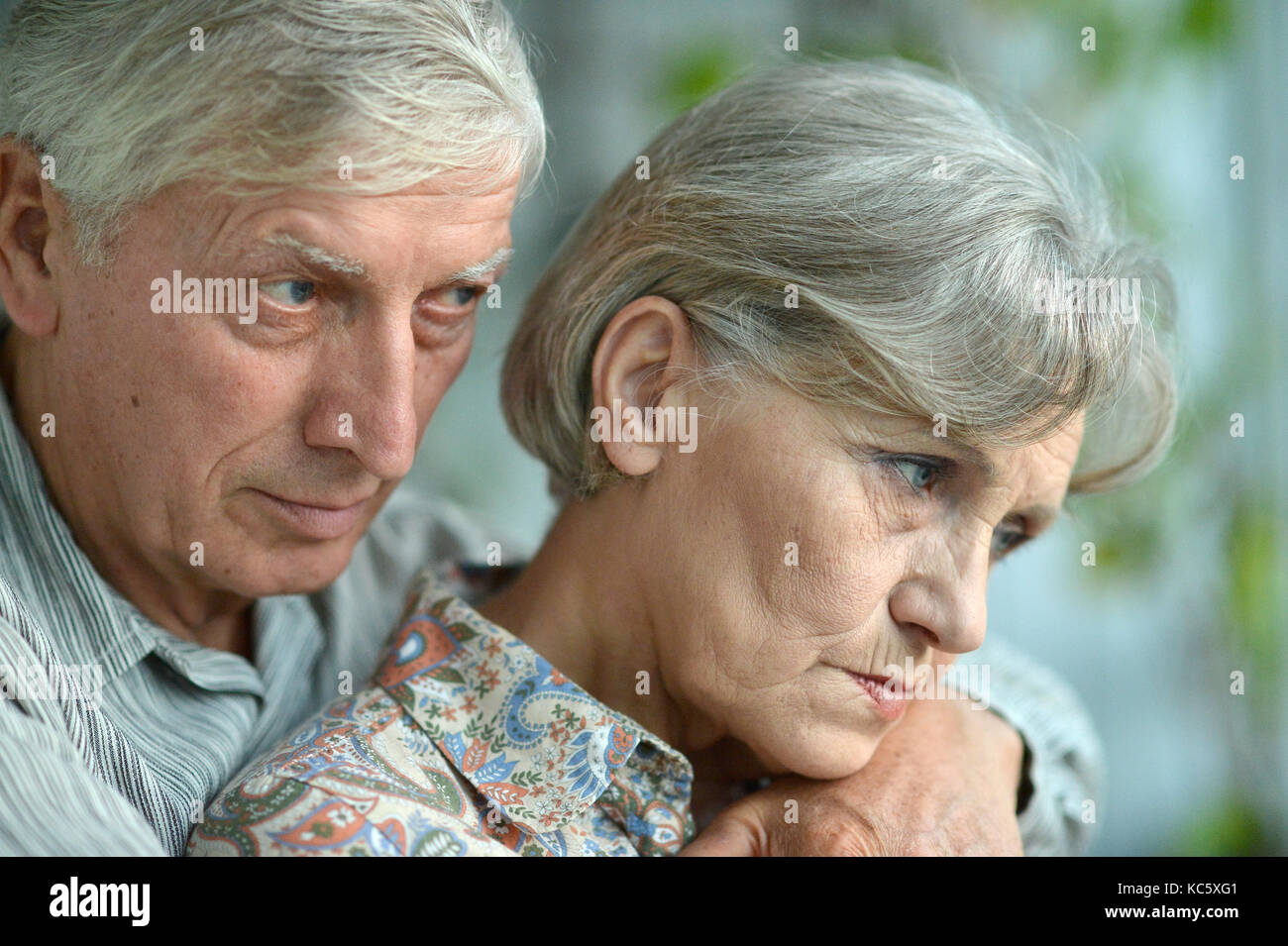 Sad senior couple Stock Photo - Alamy