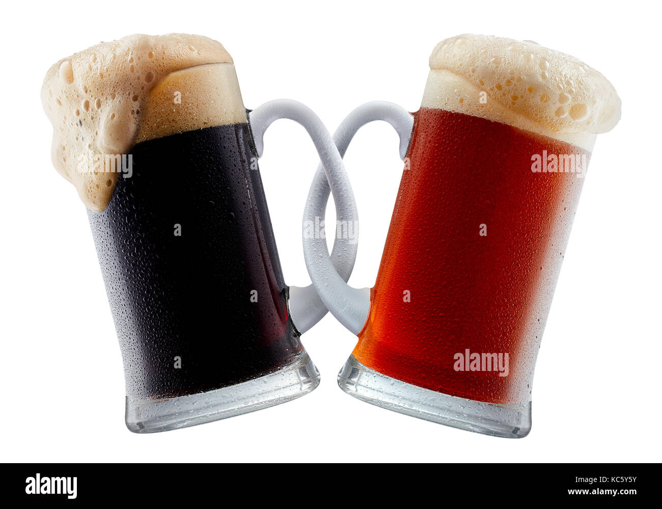 Two beer mugs making toast Stock Photo - Alamy