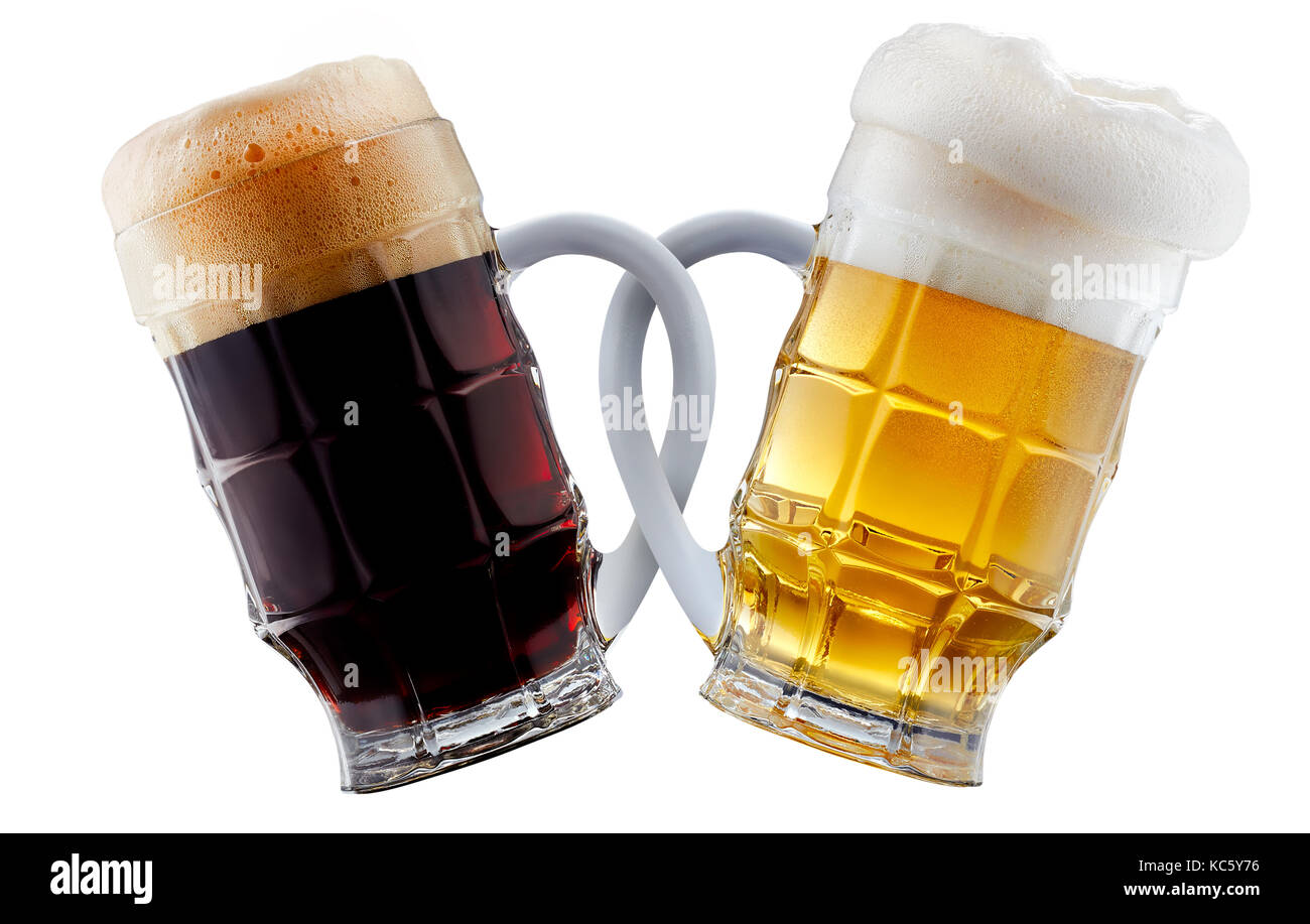 Two beer mugs making toast Stock Photo - Alamy