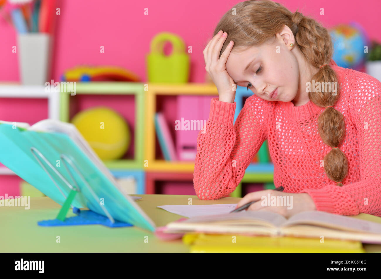 schoolgirl doing homework Stock Photo - Alamy