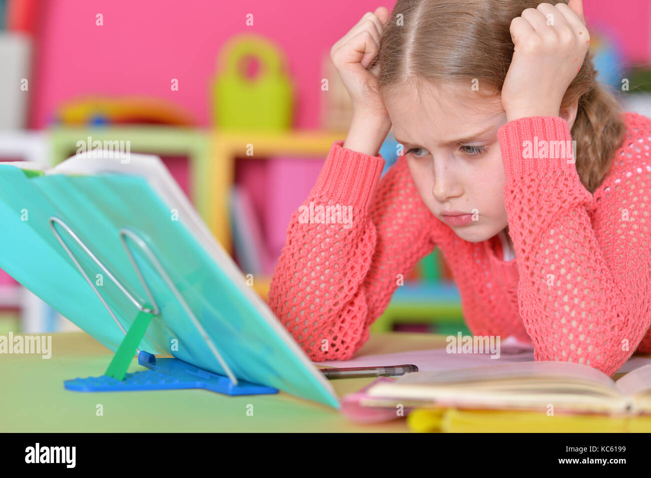 schoolgirl doing homework Stock Photo - Alamy